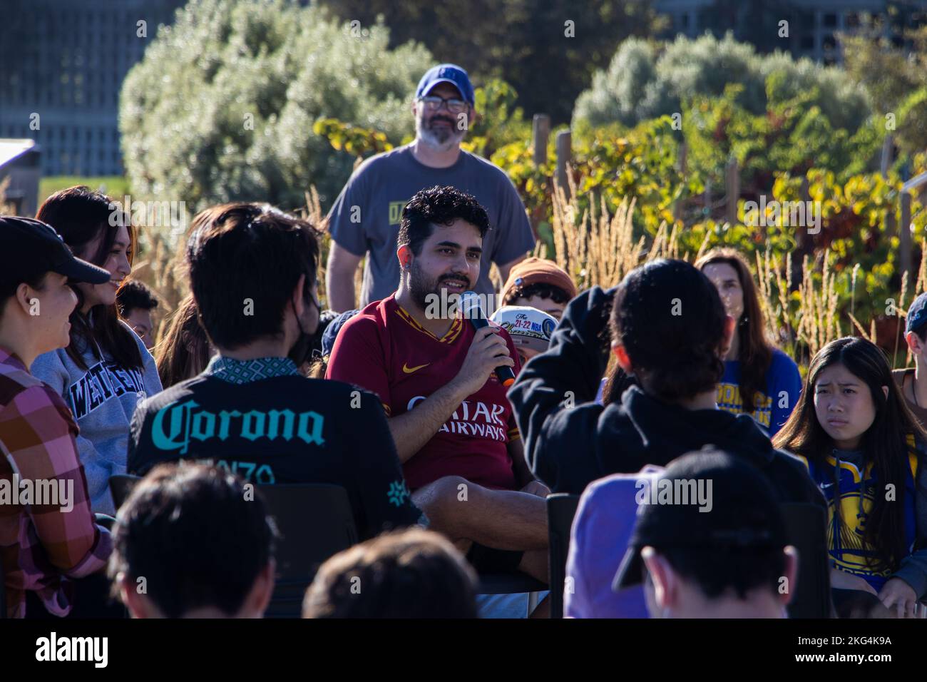 School assembly speaker with confidence in daylight outside Stock Photo ...