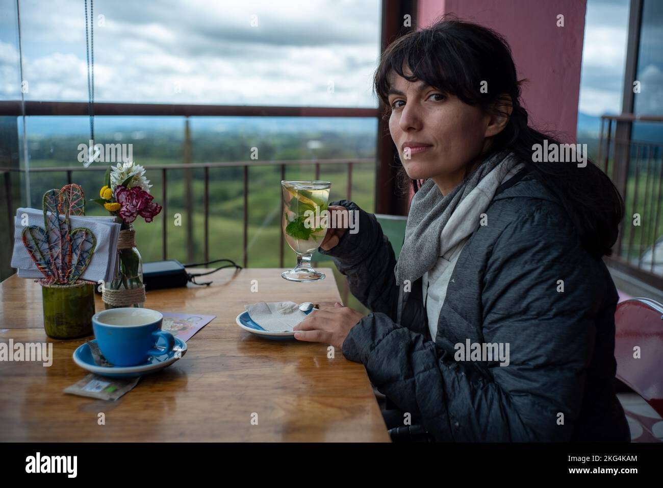 Young cute woman drinks coffee hi-res stock photography and images - Alamy