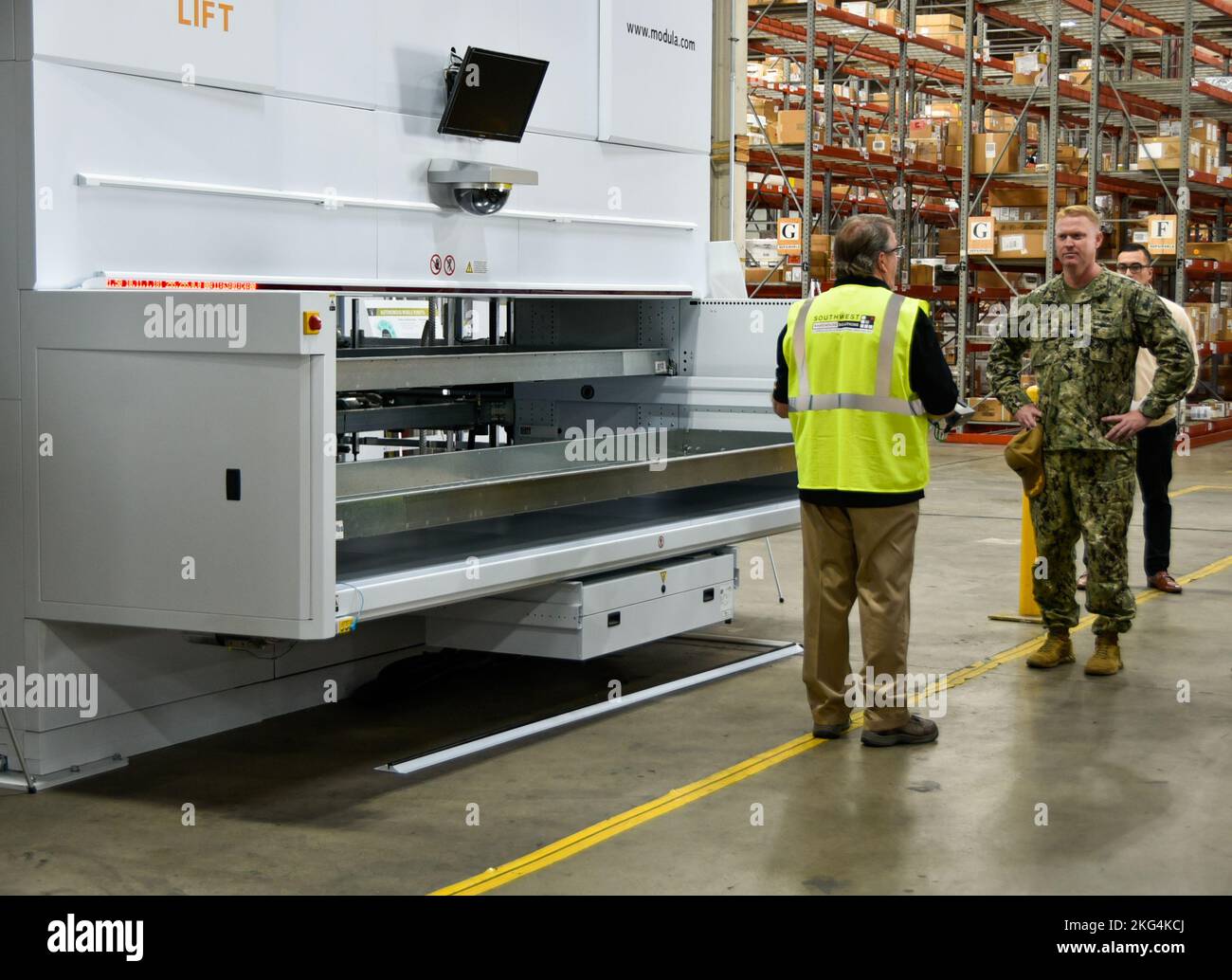 Capt. Cory Schemm, commanding officer NAVSUP FLC San Diego, speaks with ...