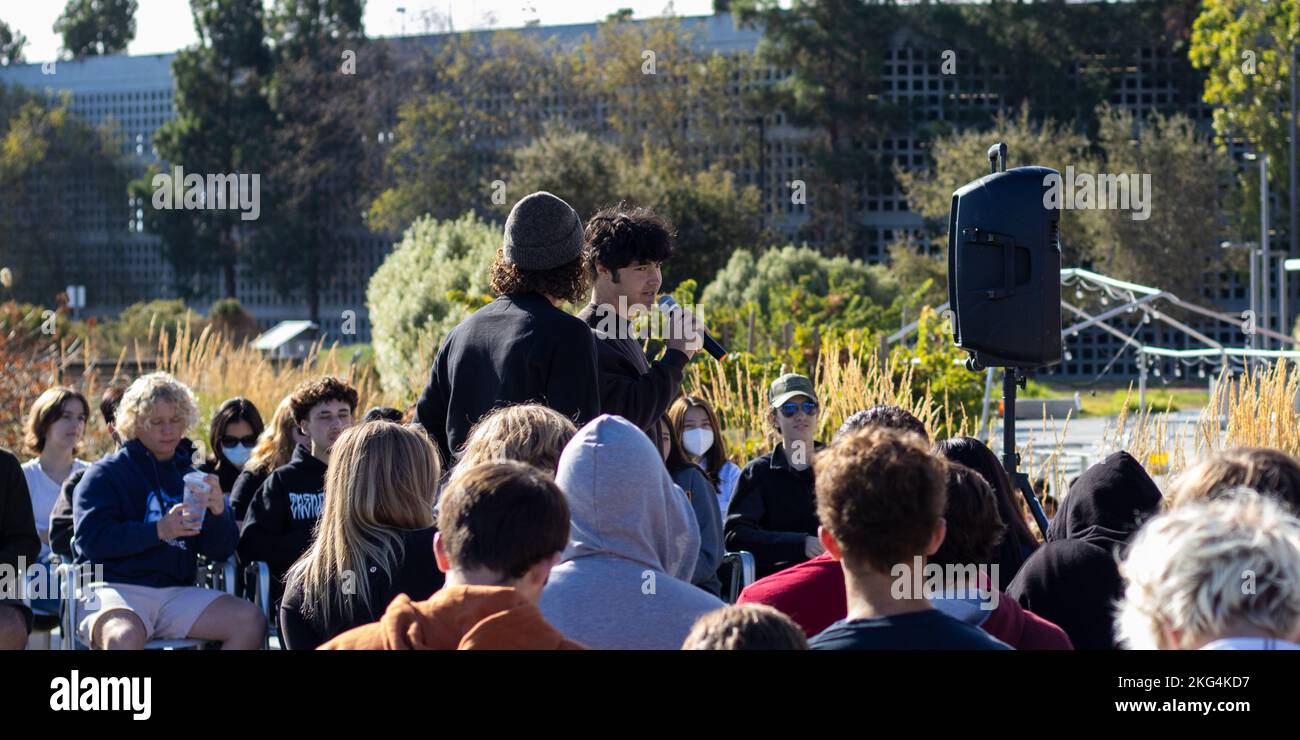 School assembly speaker with confidence in daylight outside Stock Photo ...