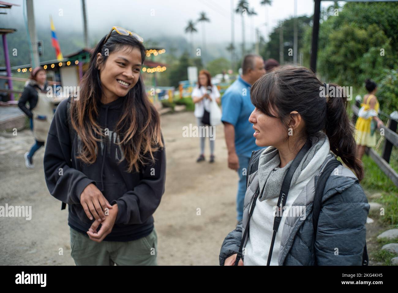 Salento, Quindio, Colombia - June 6 2022: Young Asian Woman and Latin ...