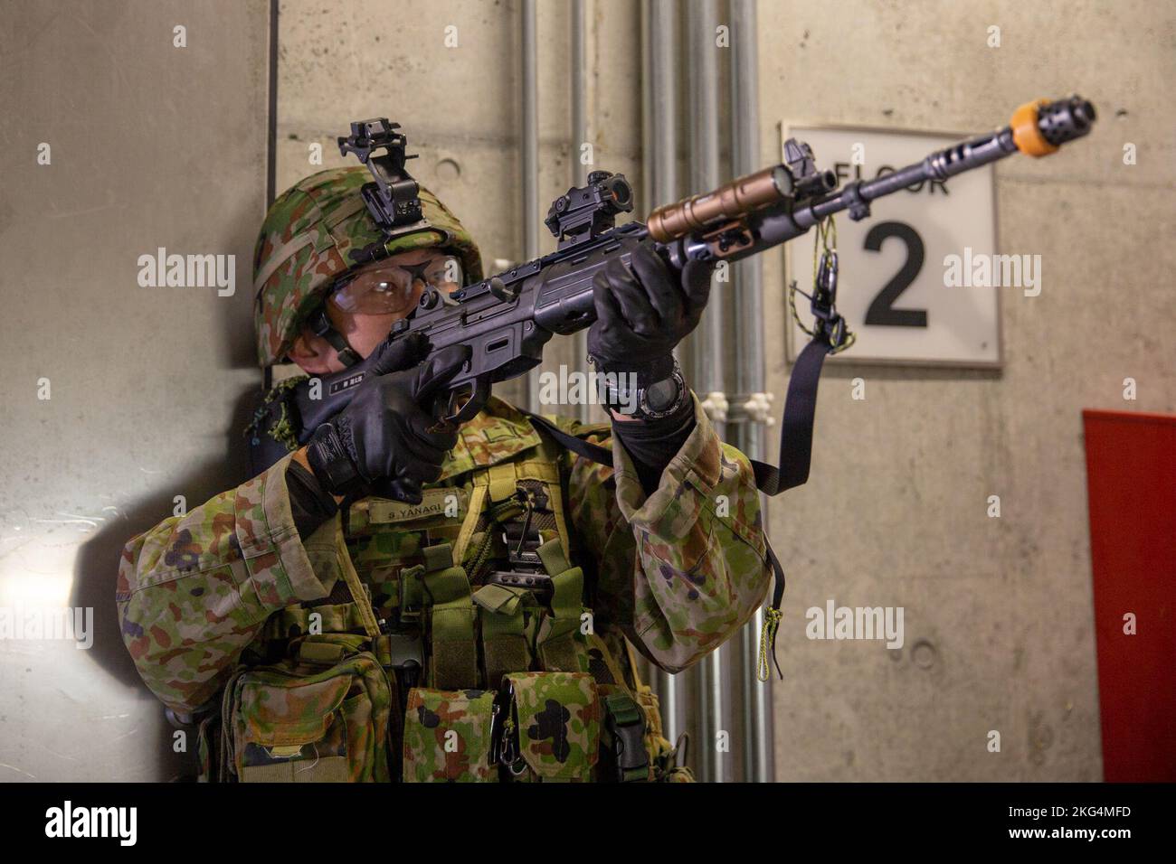 A Japan Ground Self-Defense Force member practices structure clearing ...
