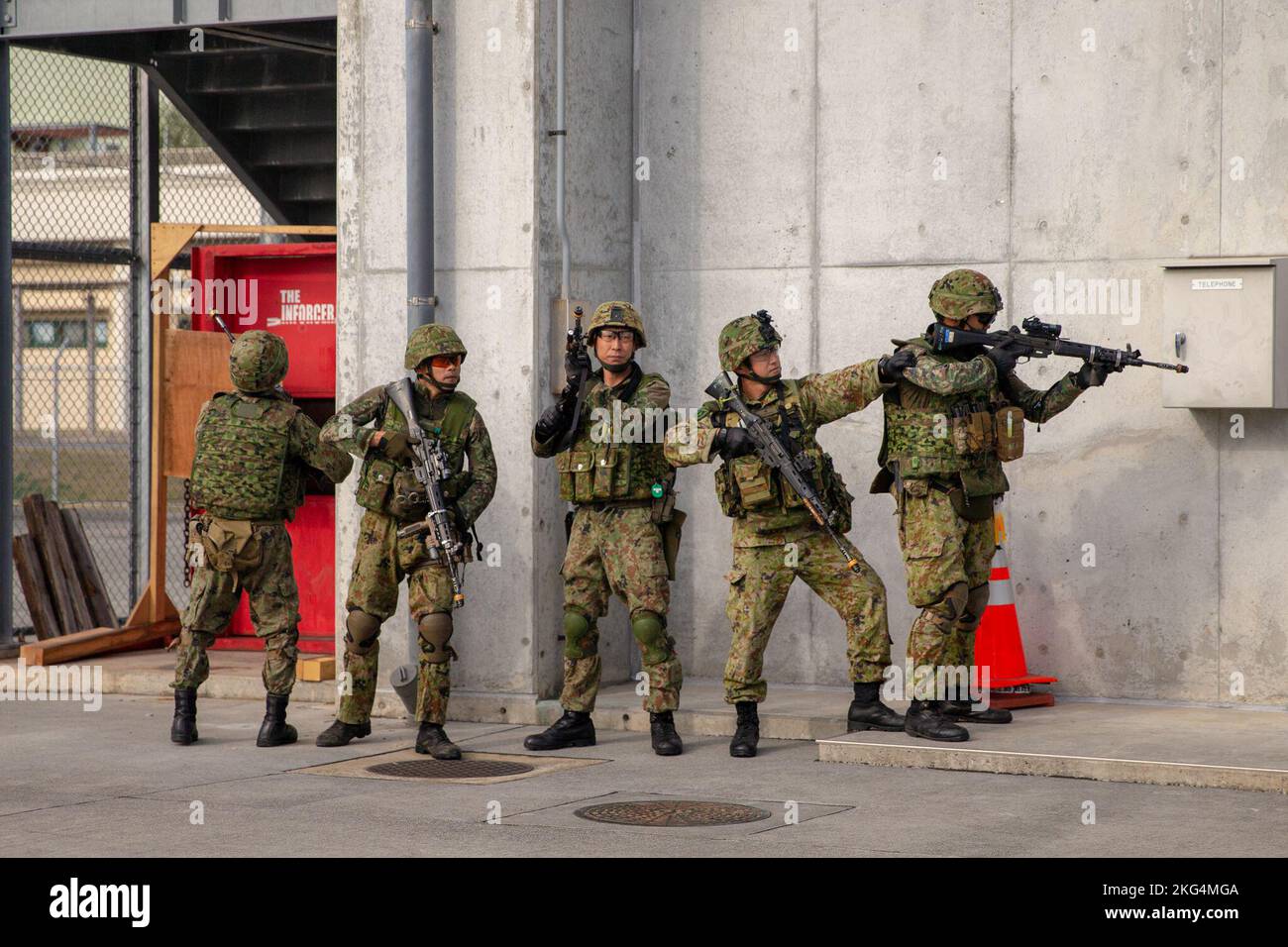 Japan Ground Self-Defense Force members prepare to conduct a structure ...