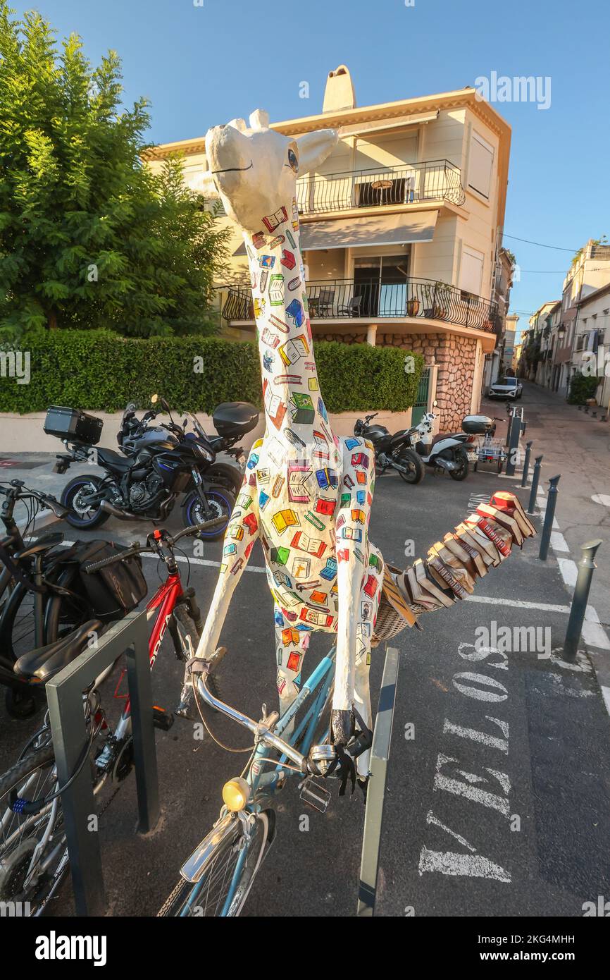 Giraffe,giraffe on a bicycle,art,installation,advertising,bookshop,in ...
