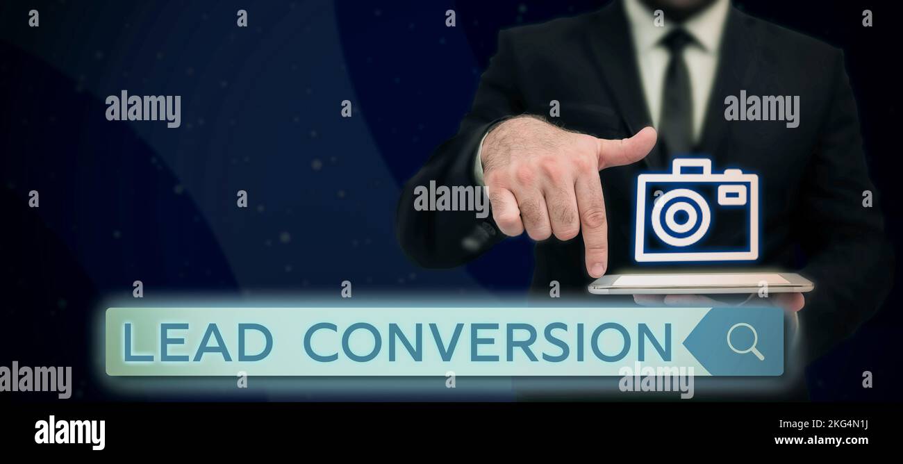 Hand writing sign Lead Conversion. Business showcase Process of turning ...