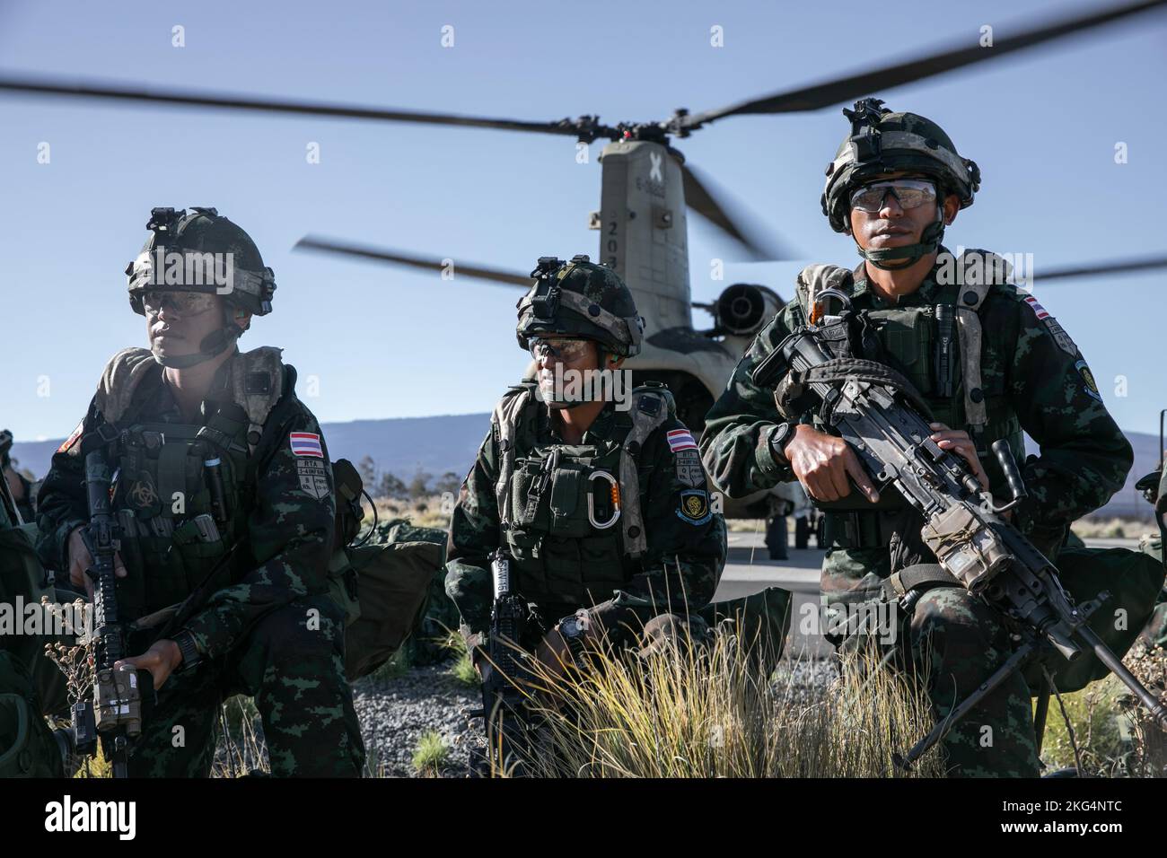 Royal Thai Armed Forces assemble into a security posture after landing ...