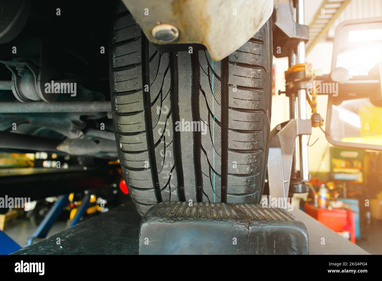 Close up of a new tire tread of a car in a auto tire shop, automobile ...