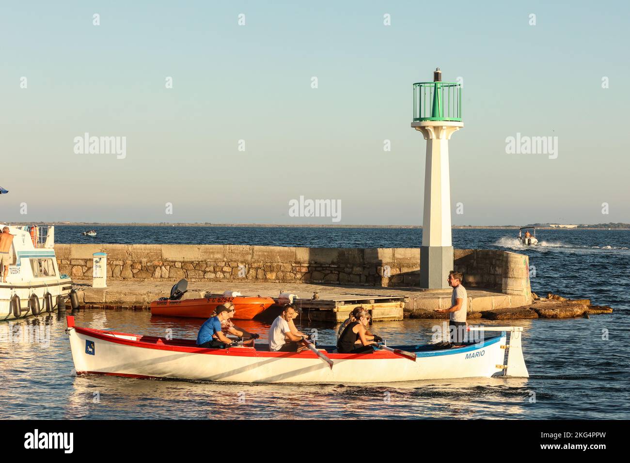 Rowing,crew,training,rowing,into,Meze Marina,at,sundown,town,of,Meze ...