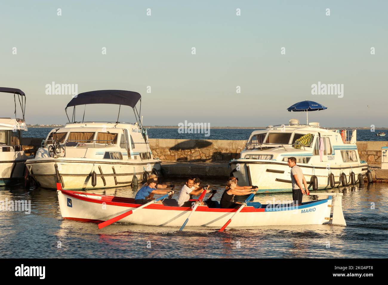 Rowing,crew,training,rowing,into,Meze Marina,at,sundown,town,of,Meze ...