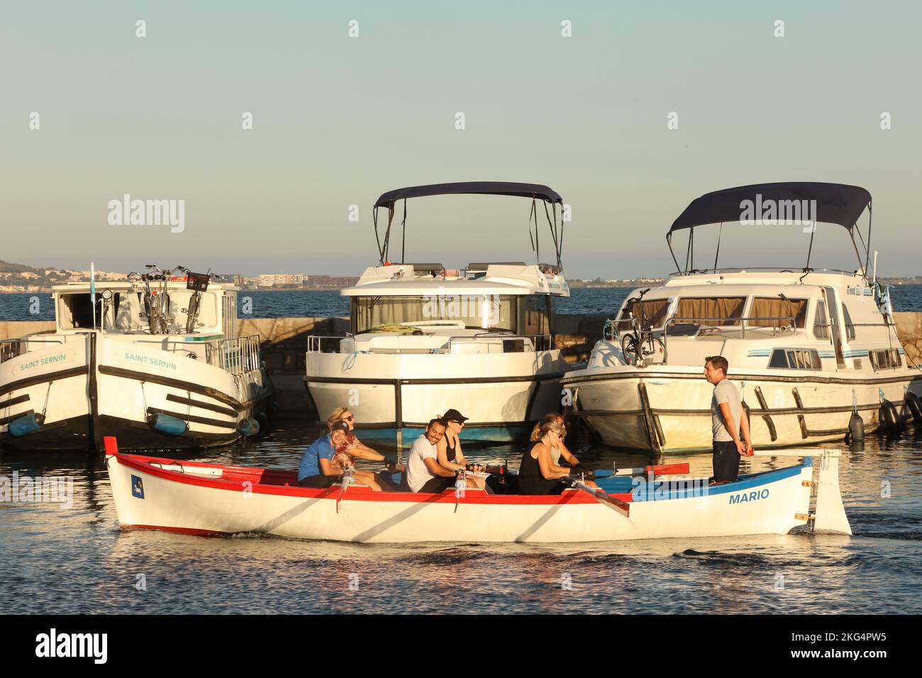 Rowing,crew,training,rowing,into,Meze Marina,at,sundown,town,of,Meze ...