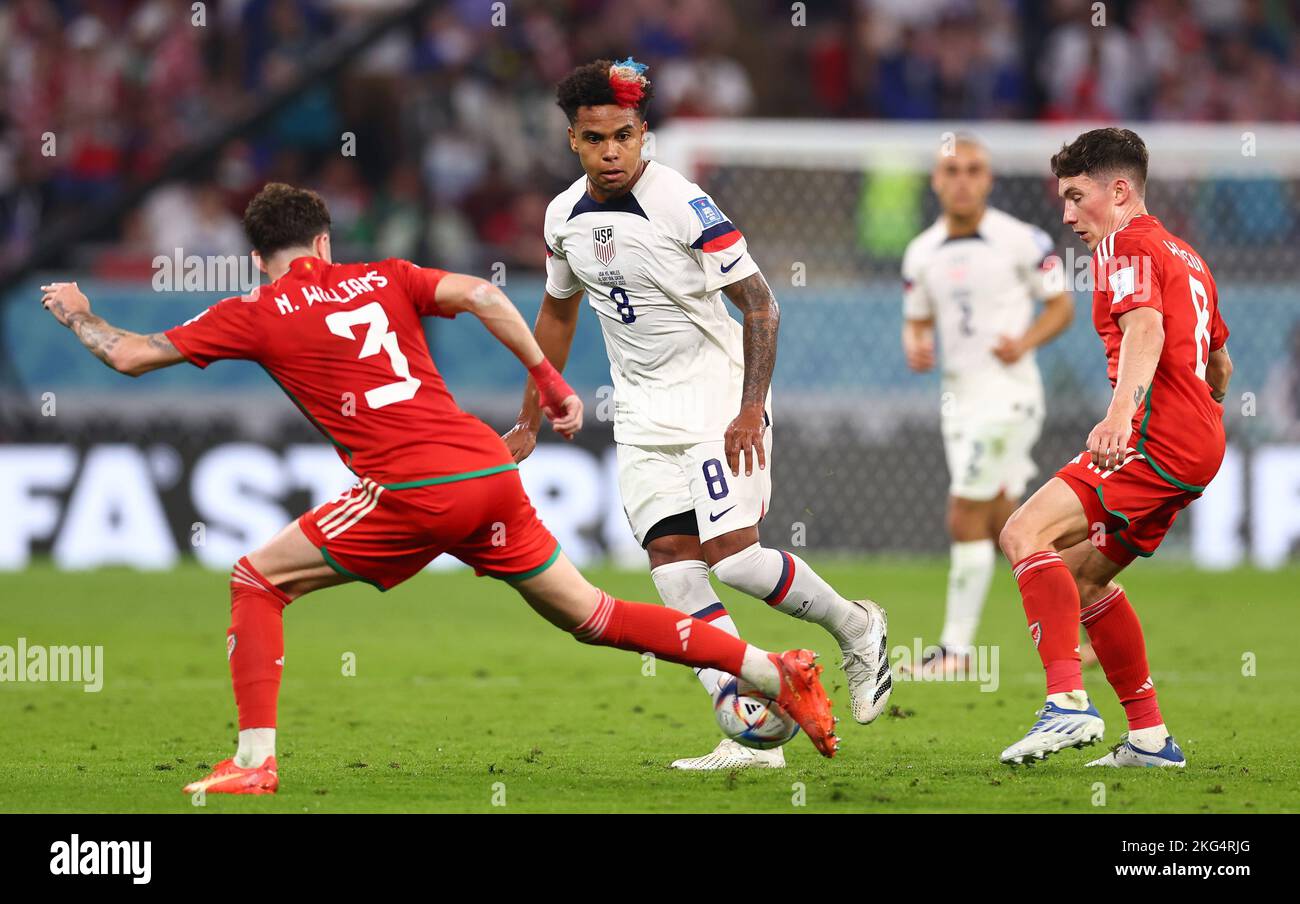 Al Rayyan, Qatar. 21st Nov, 2022. Weston McKennie of USA tackled by ...