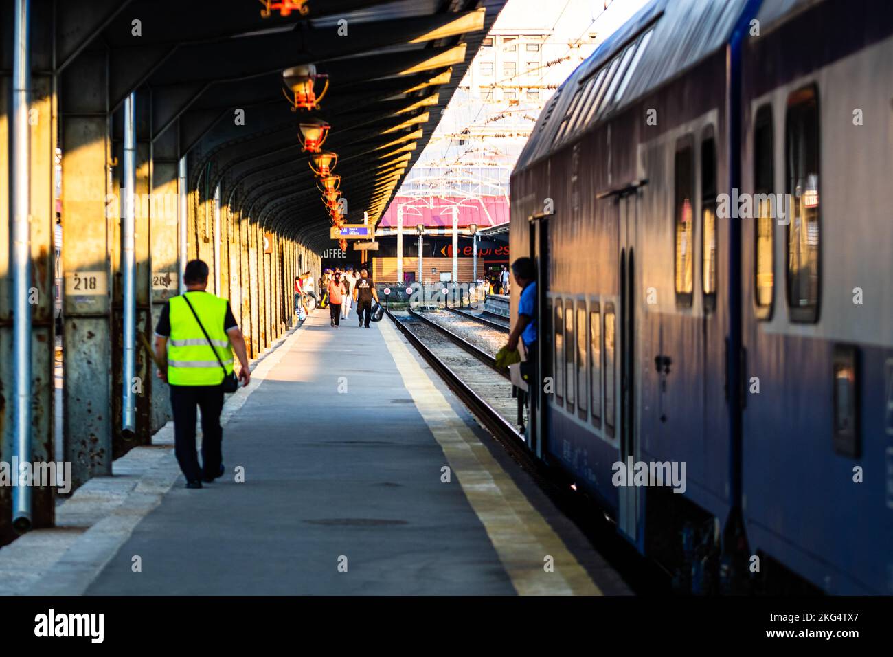 Railworker, train staff signaling for train conductor in Bucharest ...