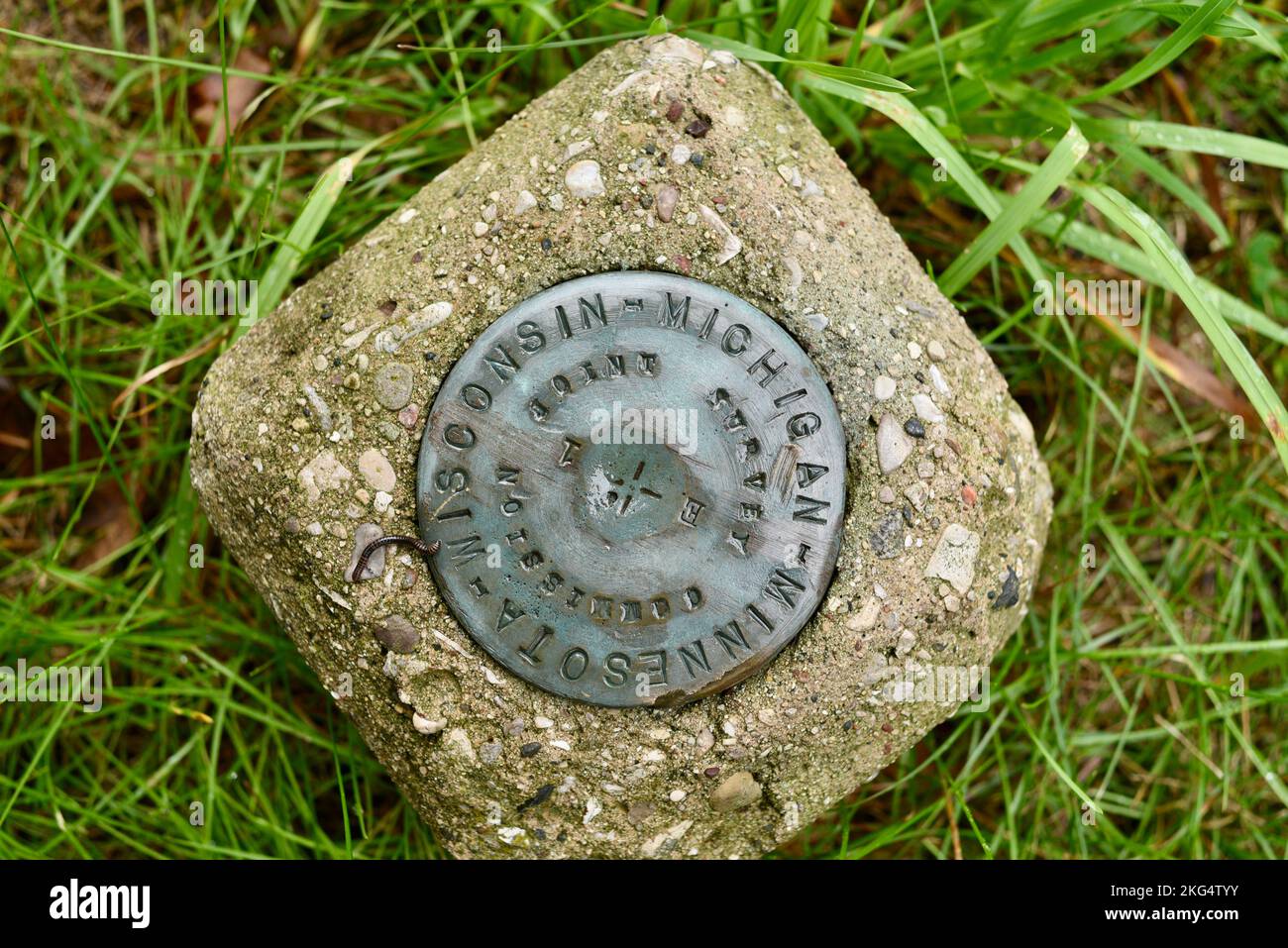 Survey marker medallion mounted in cement at the Upper Range Light at ...