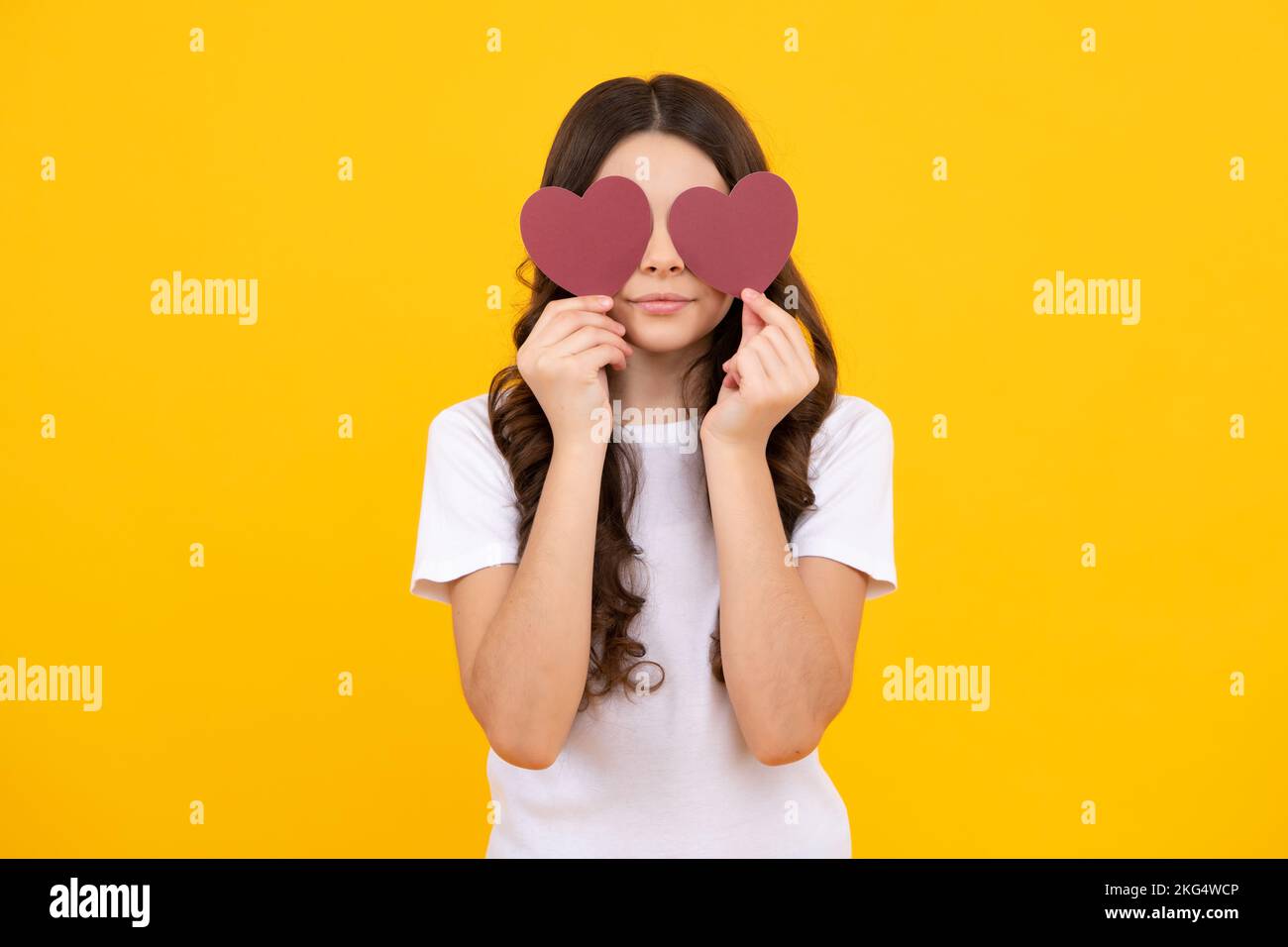 Lovely child girl 12, 13, 14 years old with shape heart love holiday ...