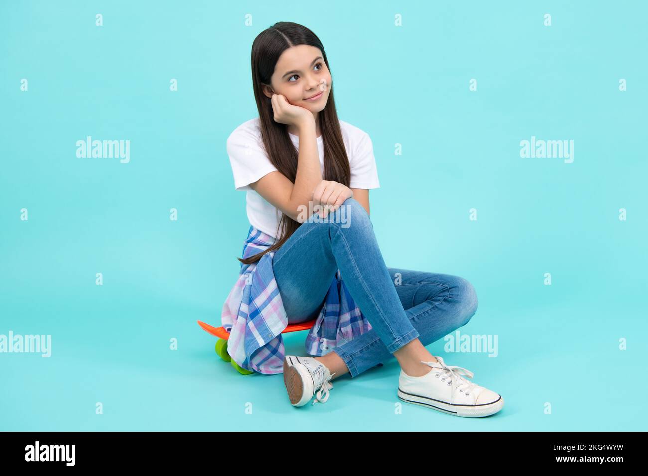 Fashion child girl wearing trendy t-shirt and jeans urban hipster style ...