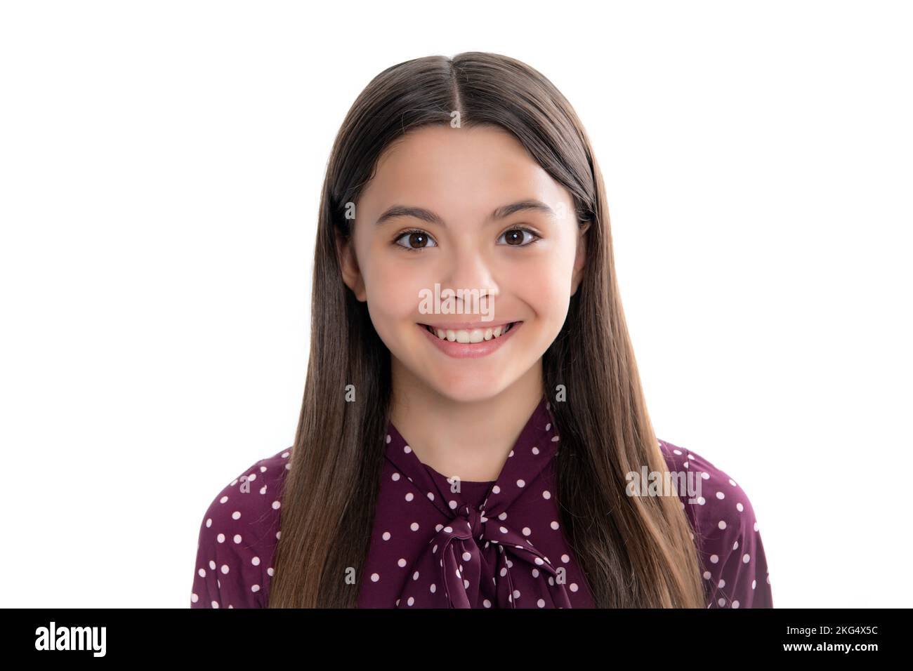 Portrait of happy smiling teenage child girl. Close up portrait of pretty teen girl. Latin or ...