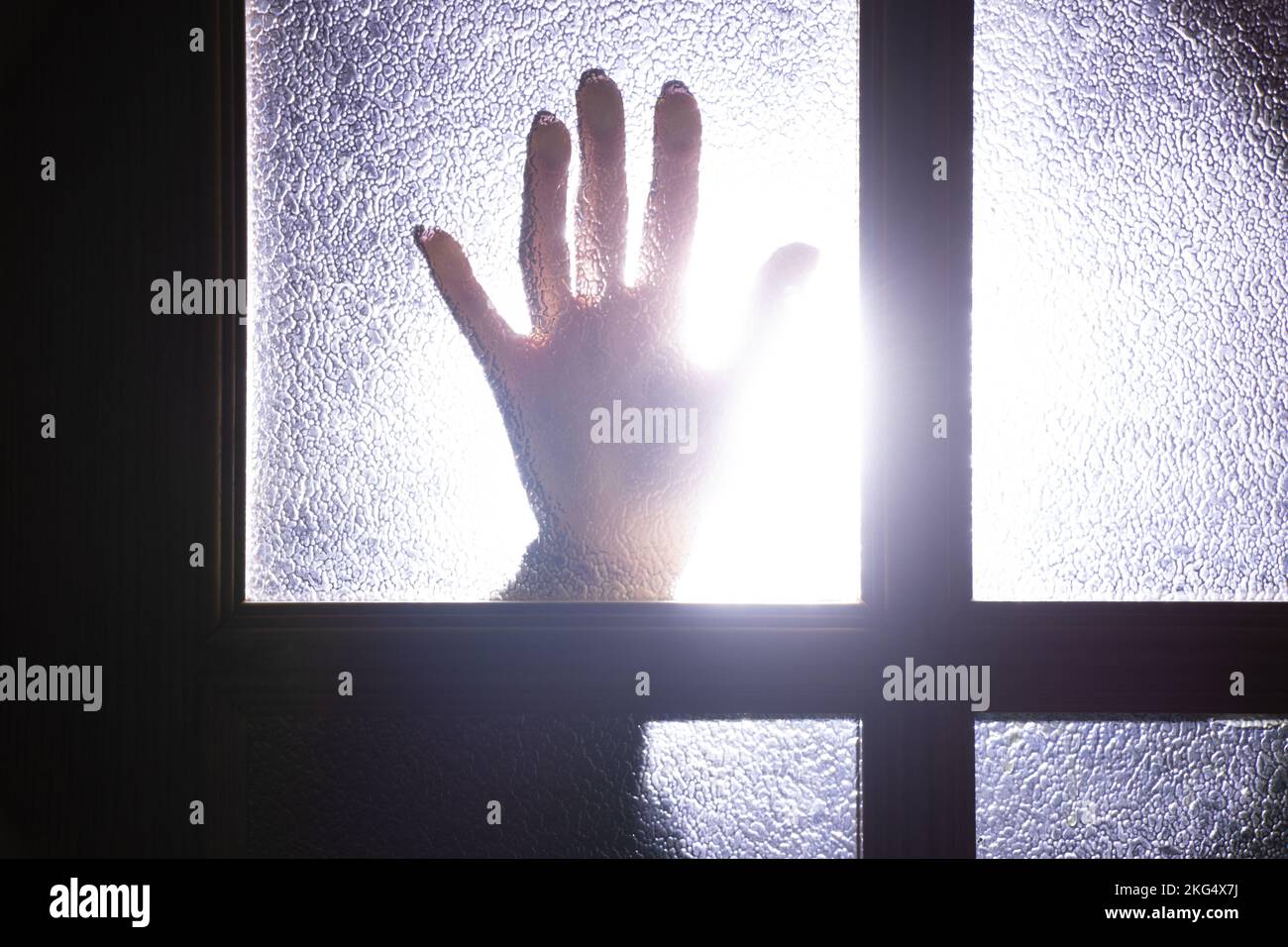 Shadow behind glass door hi-res stock photography and images - Alamy