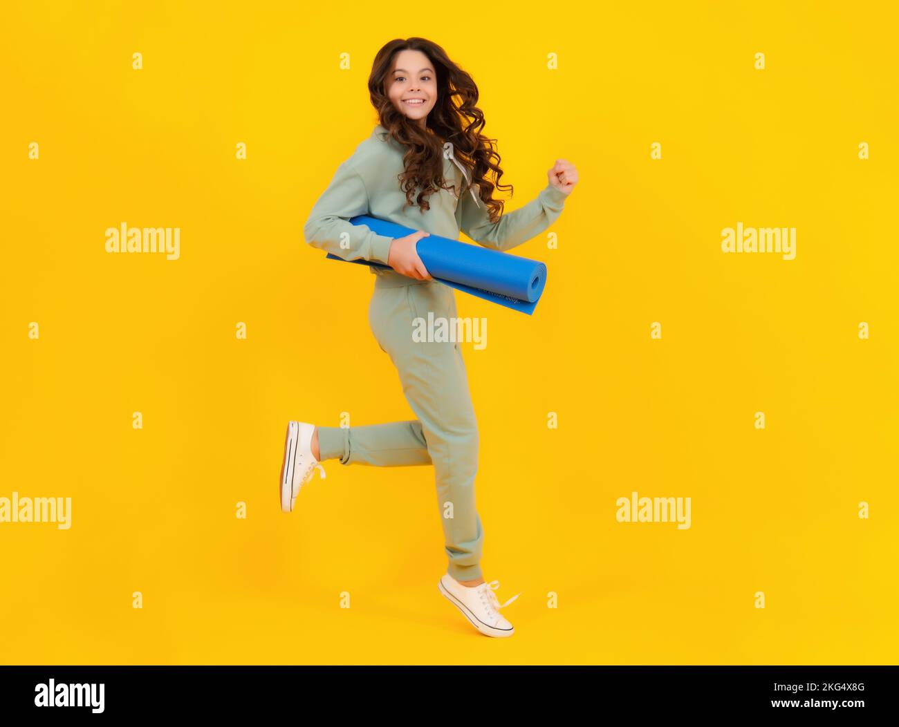 Teen girl dressed in sports uniform. Teenager in a posh stylish sports ...