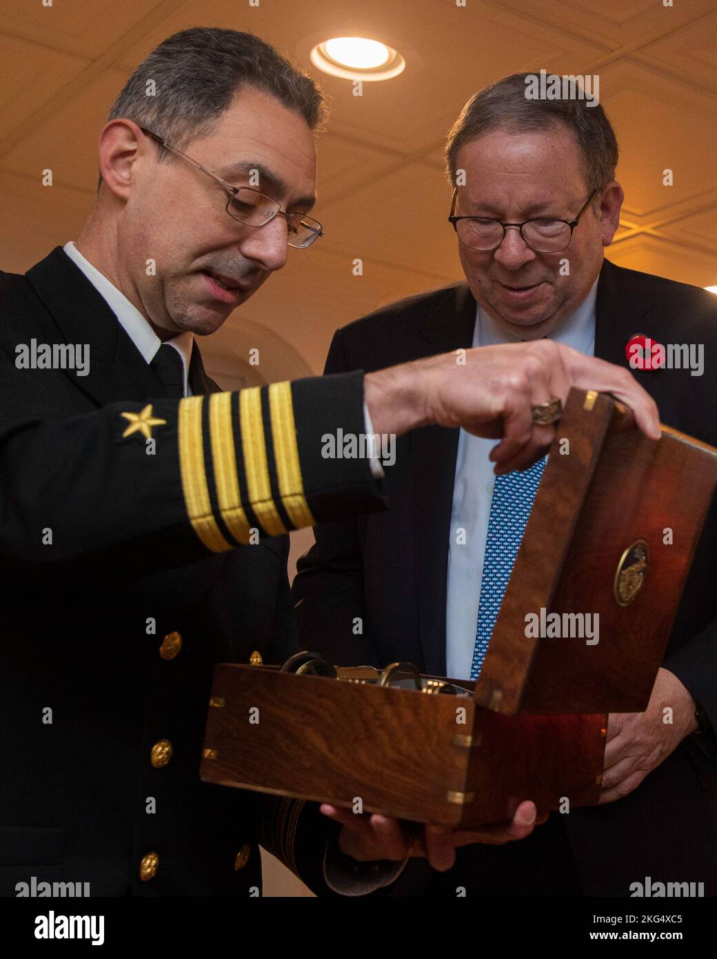 U.S. Ambassador to Canada David Cohen, right, is presented with a gift ...