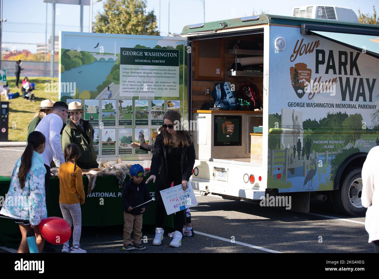 National Park Service rangers interact with the families present at the ...