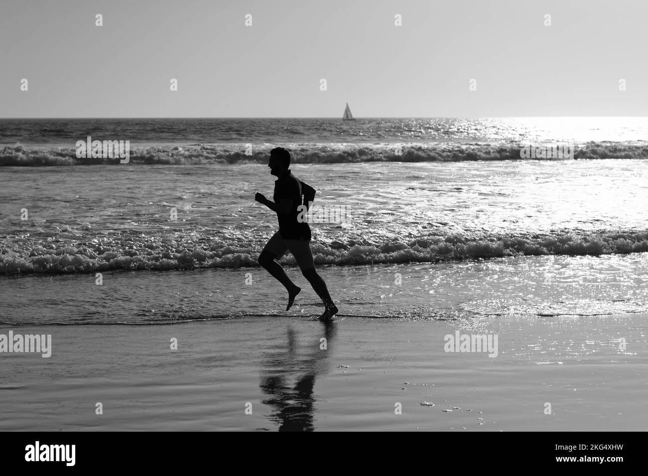 healthy man running on beach. energetic summer. runner feel freedom ...