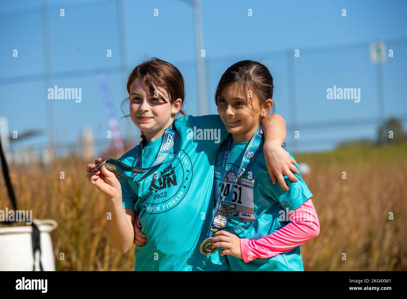 Kids celebrate after finishing the Marine Corps Marathon Kids Run at ...