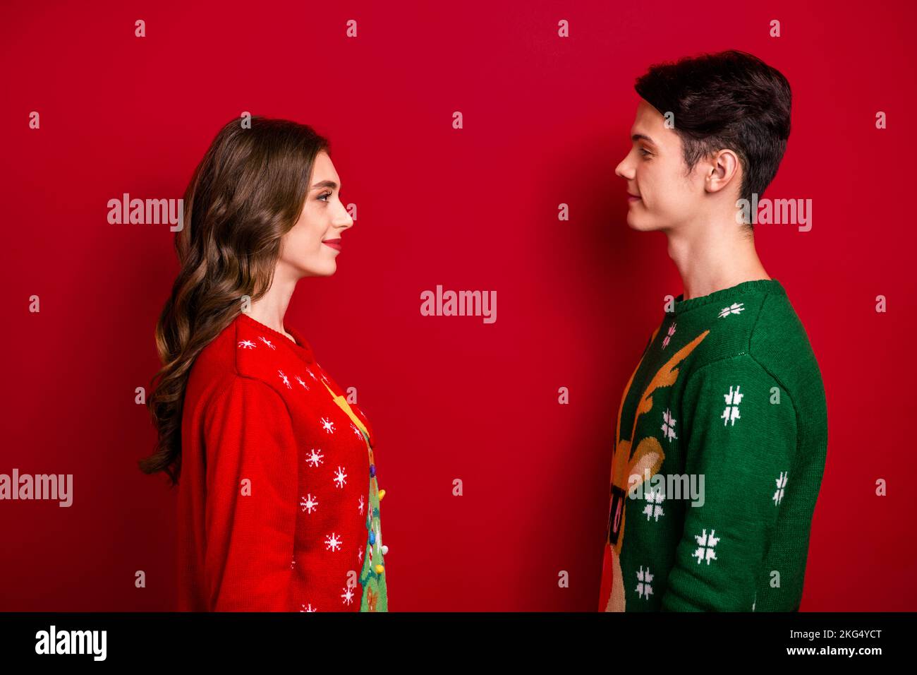 Profile portrait of two positive friendly people look each other ...