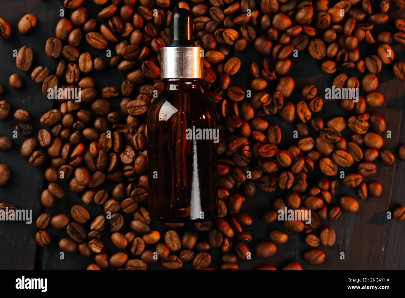 Essential oil coffee for men. Brown bottle with coffee Stock Photo - Alamy