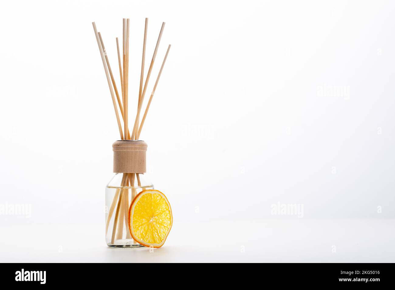 Citrus reed diffuser for home on white background Stock Photo - Alamy