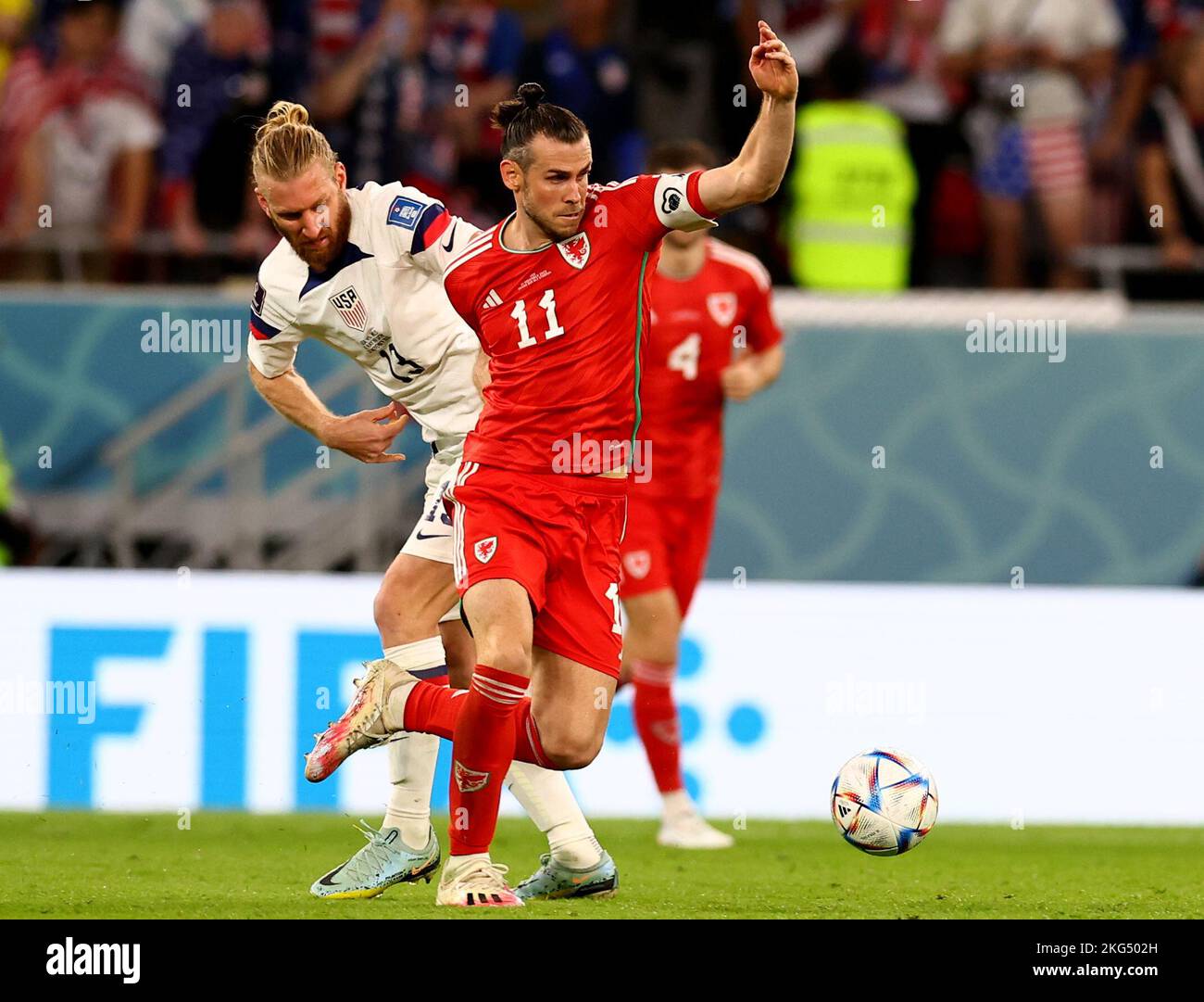 Al Rayyan, Qatar. 21st Nov, 2022. Tim Ream of USA fouls Gareth Bale of ...