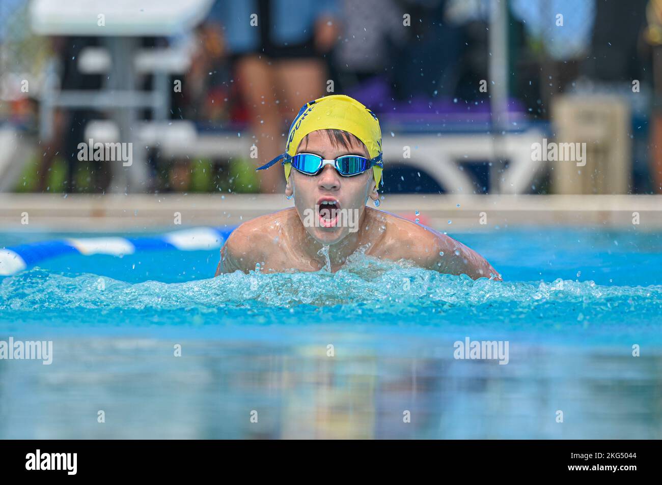 A swimmer with the Andersen Marlins swims butterfly during a Guam ...