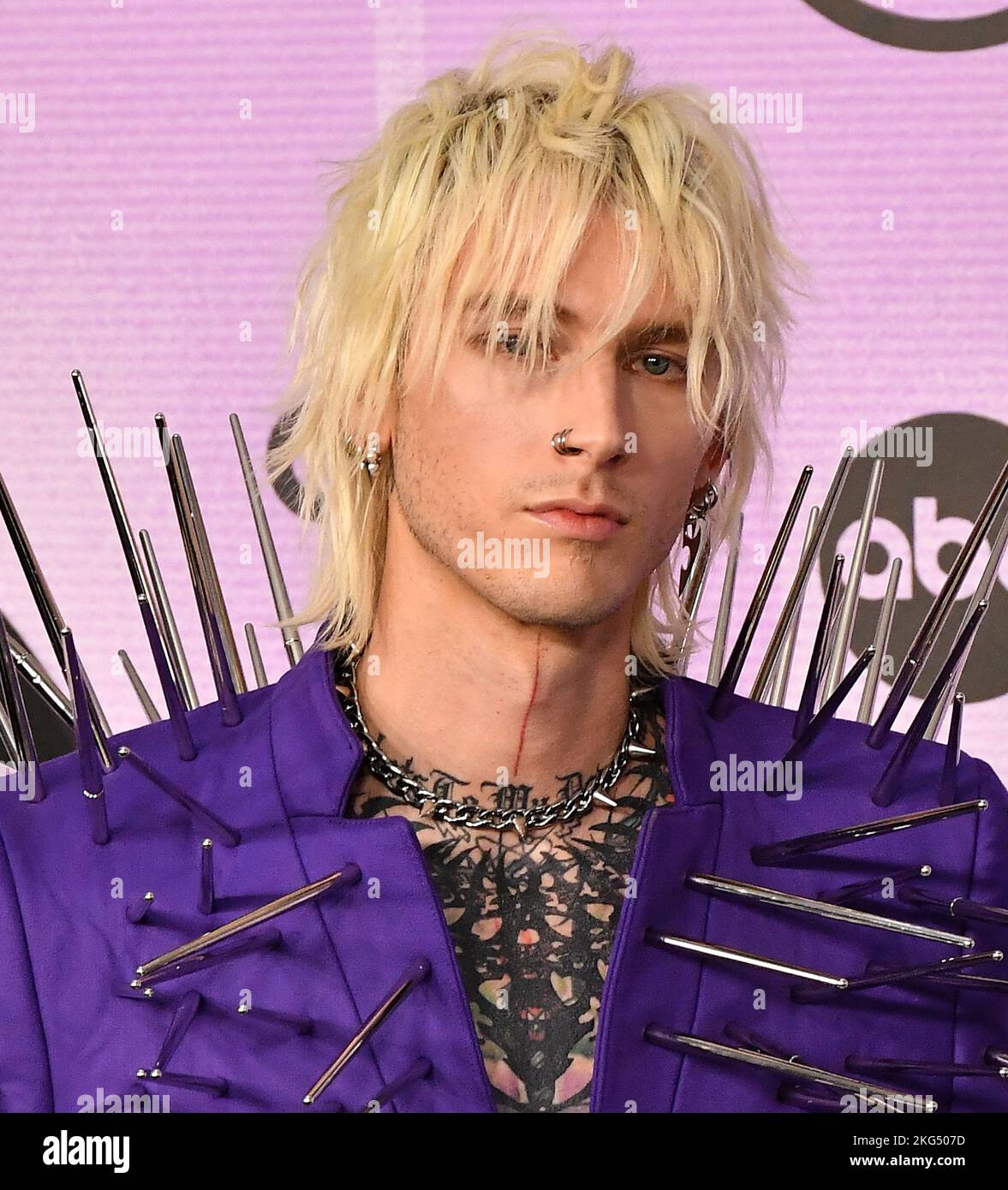 Machine Gun Kelly attends the 2022 American Music Awards at Microsoft ...
