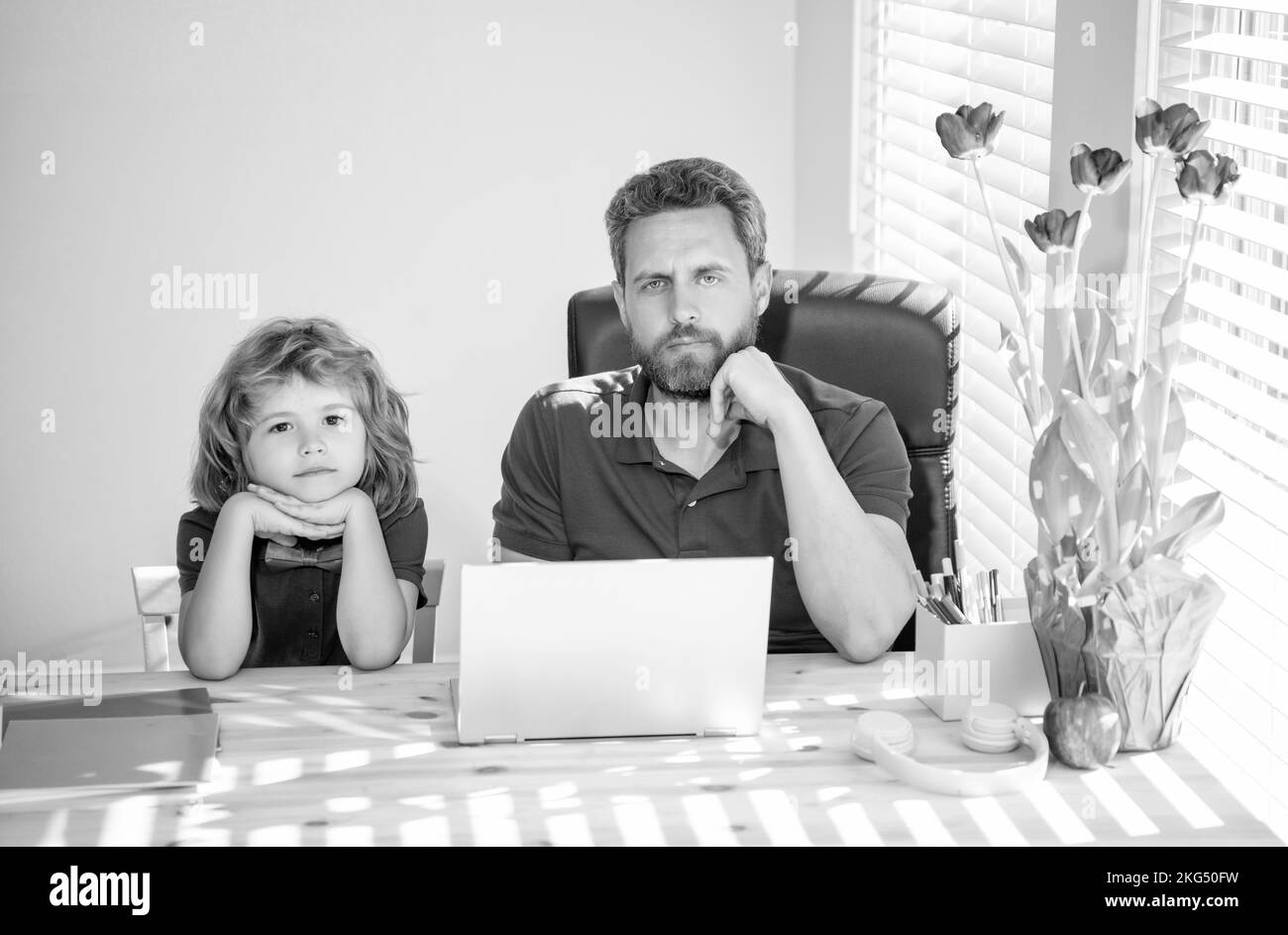 mature man teacher or dad helping kid son with school homework on ...