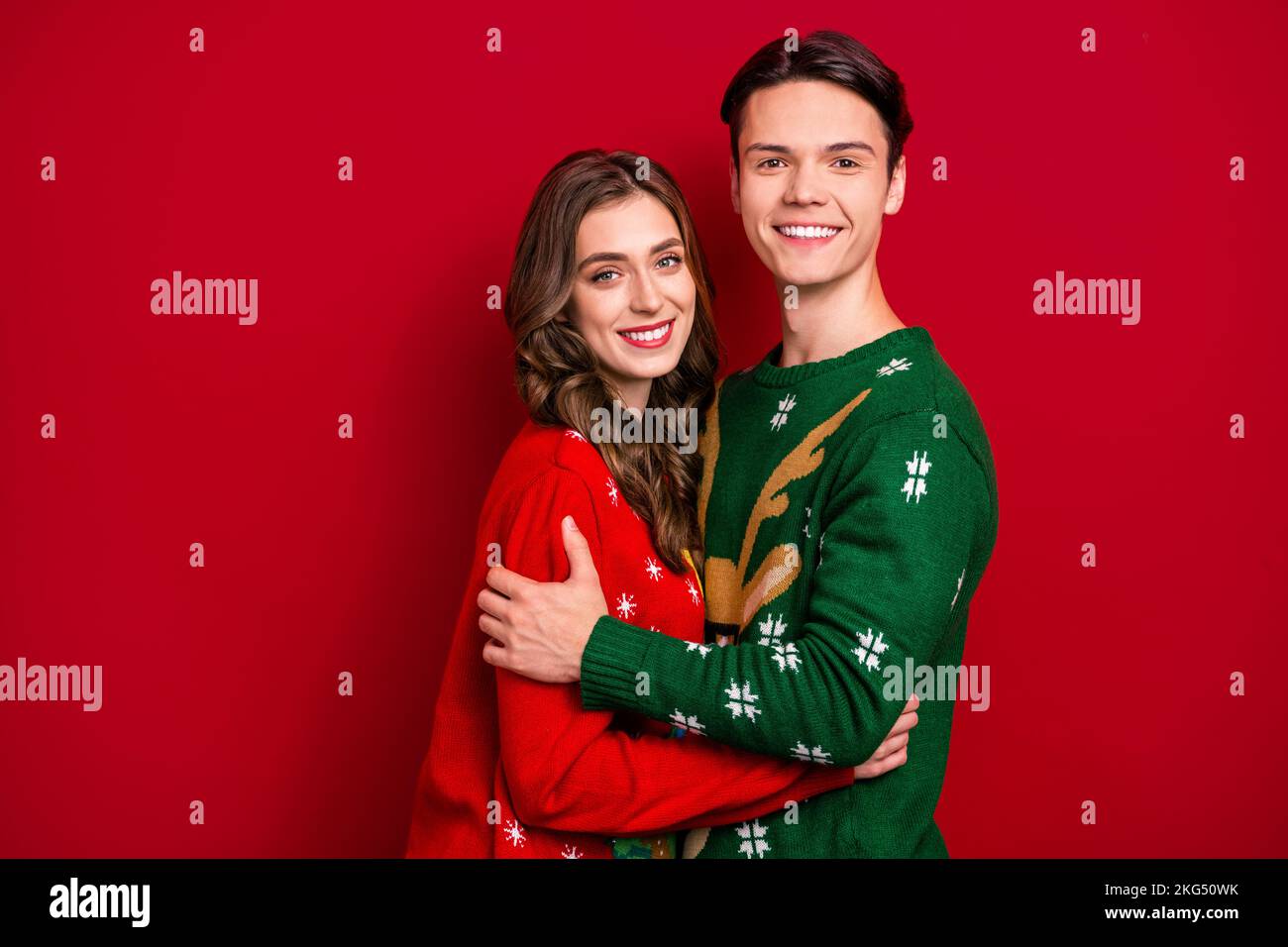 Portrait of two peaceful lovely people cuddle embrace toothy smile ...