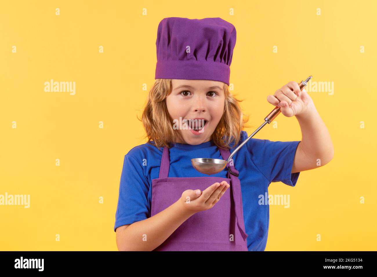 Funny kid chef cook with kitchen ladle, studio portrait. Cooking ...