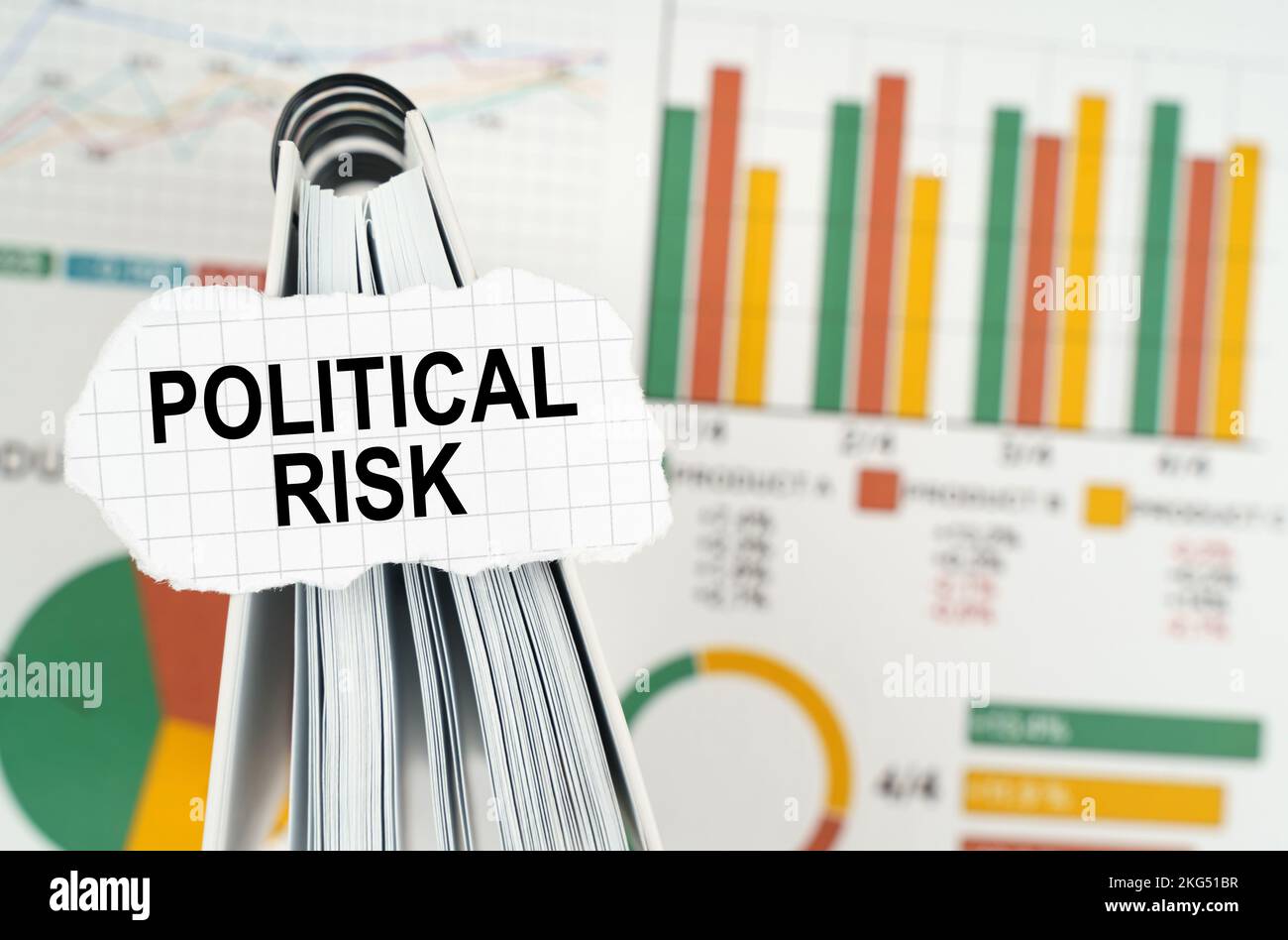 Business concept. On the business charts there is a notebook on which there is a paper plate ...