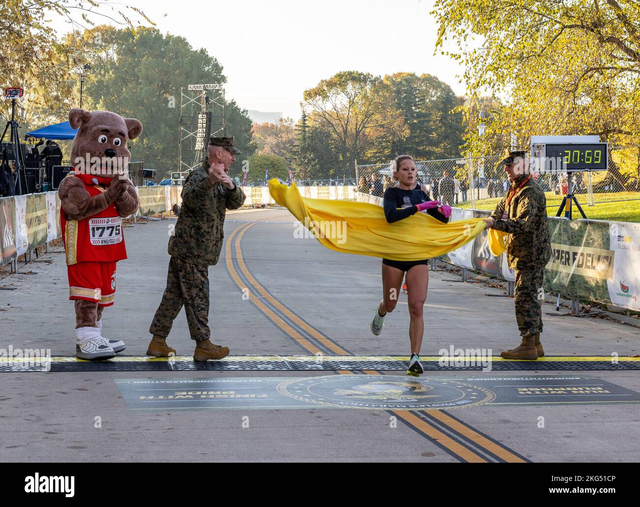Mary Reiser, a native of Baltimore, Maryland, crosses the finish line ...