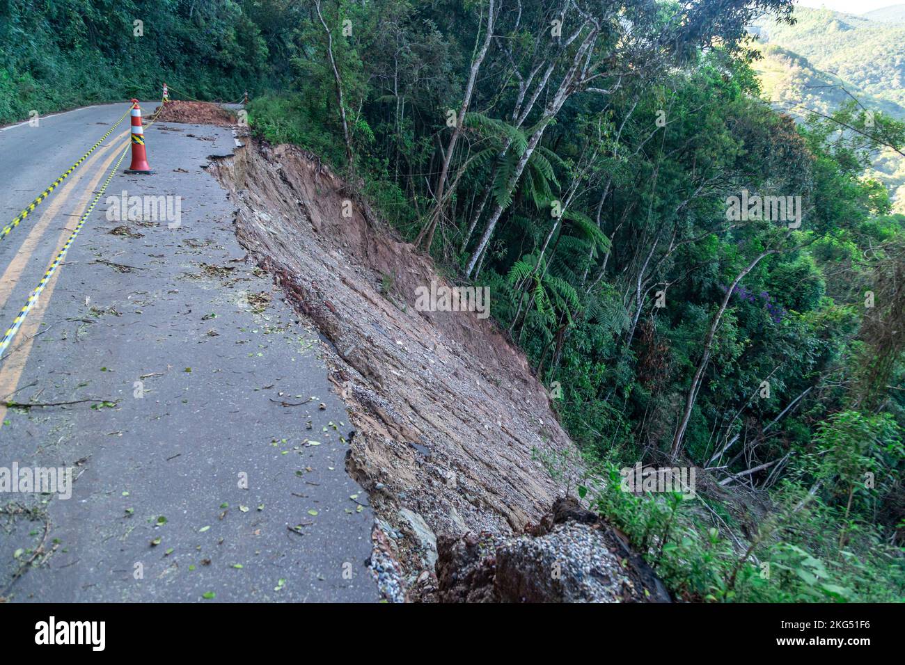 asphalt road damaged by a landslide in a mountain area Stock Photo - Alamy