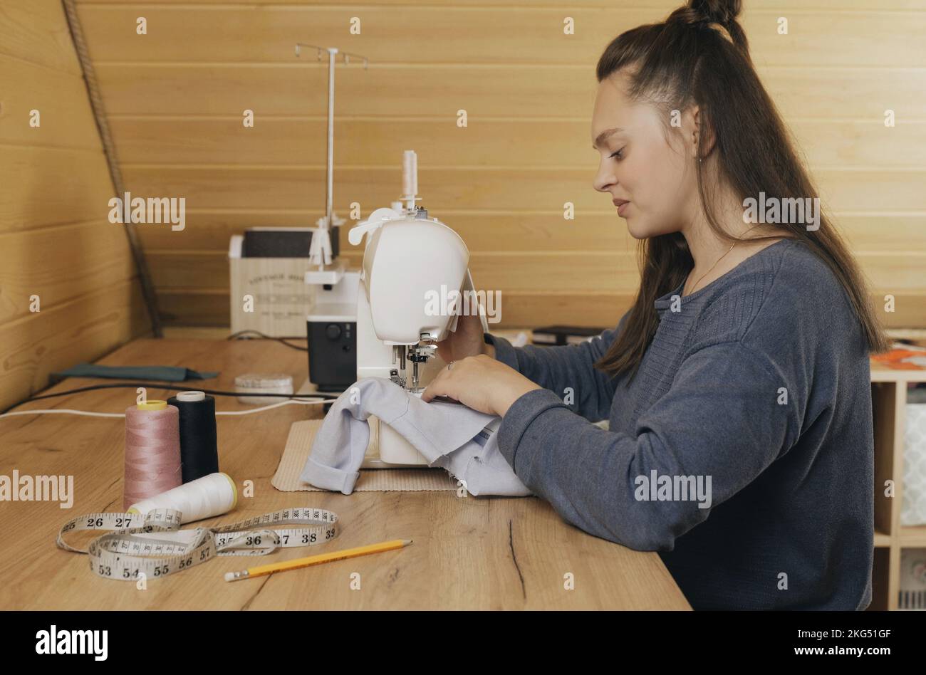 Fashion designer sews dress hi-res stock photography and images - Alamy