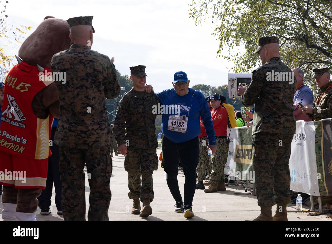 Daniel Cook, a 71-year old U.S. Marine Corps veteran, crosses the ...
