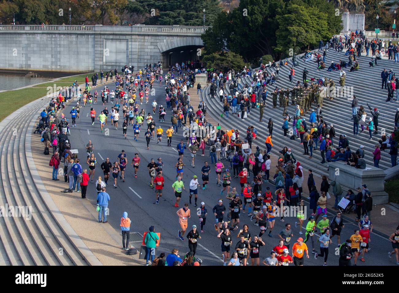 Runners participating in the 47th Marine Corps Marathon run towards ...