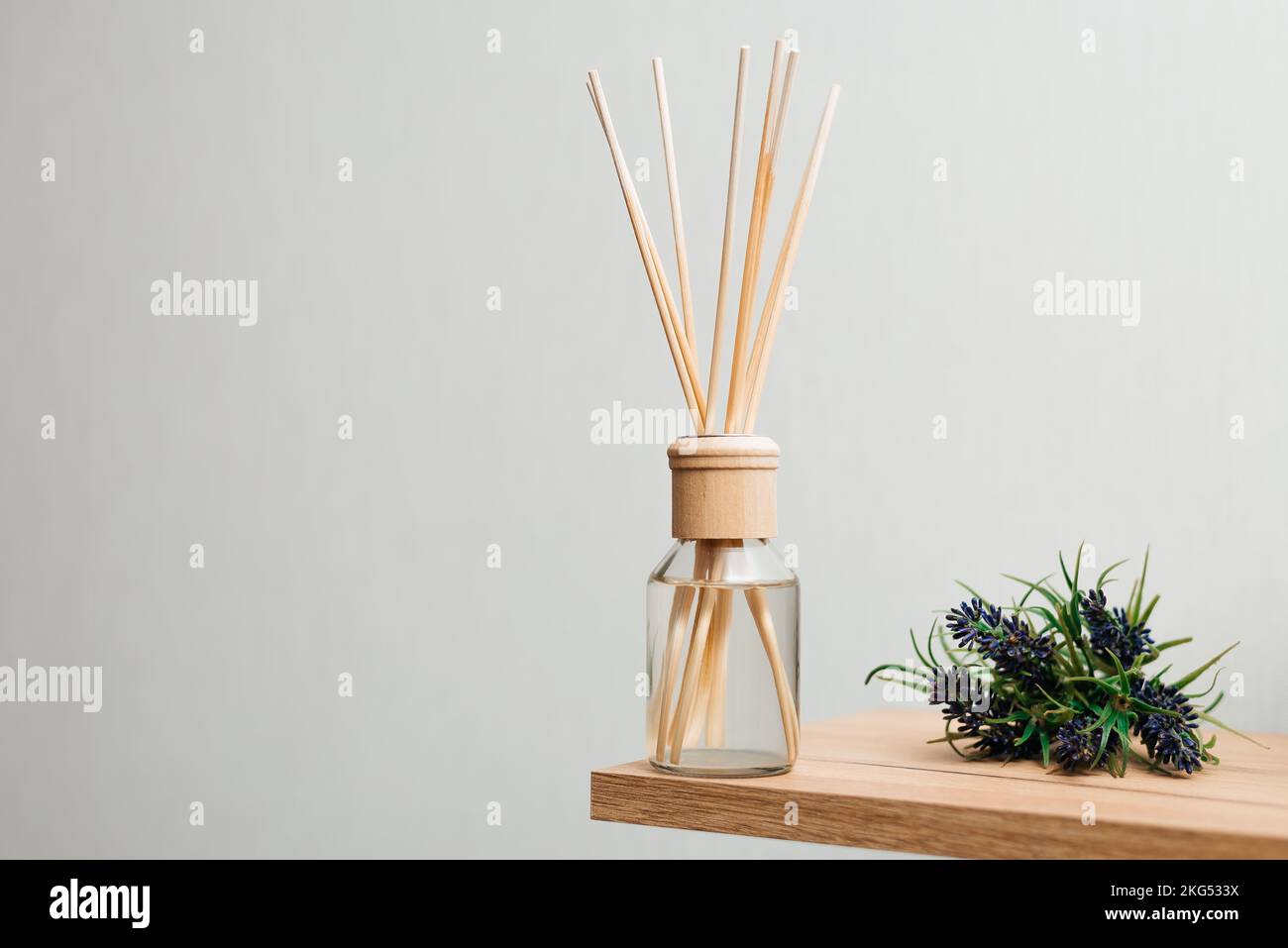 Herbal reed diffuser on white background Stock Photo - Alamy