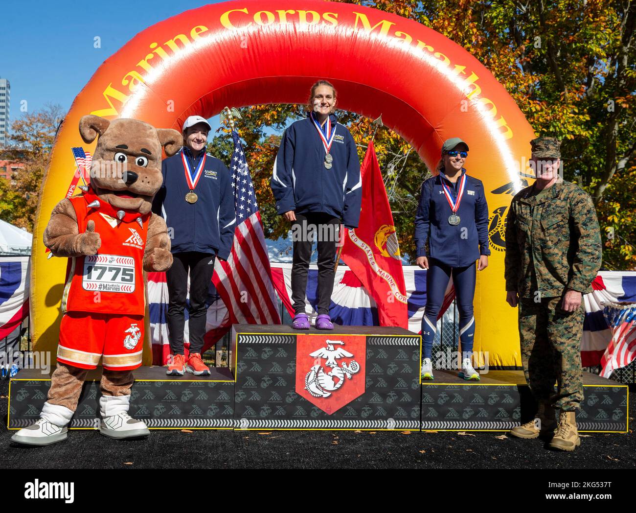 U.S. Navy Running Team participants Lt. Cmdr. Katherine Irgens, Lt ...