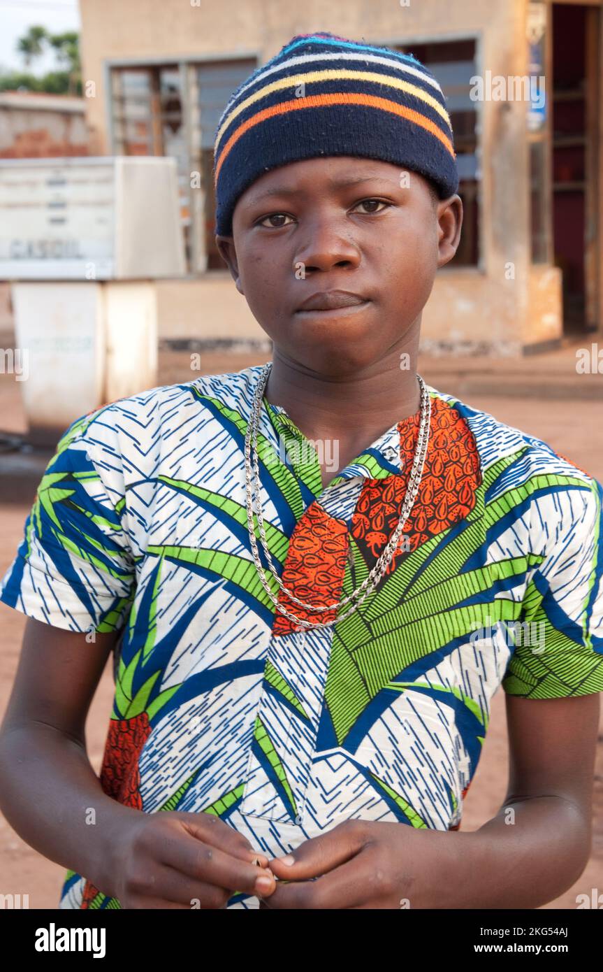 Trendy young man with stripey hat and African clothes, Azove, Couffo ...