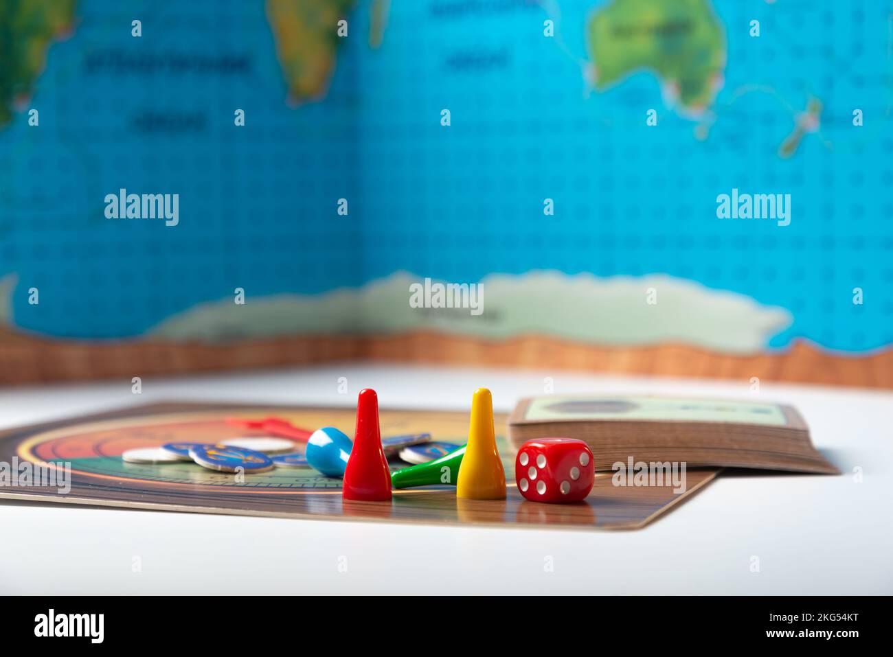 A cube with numbers and chips for board game Stock Photo - Alamy