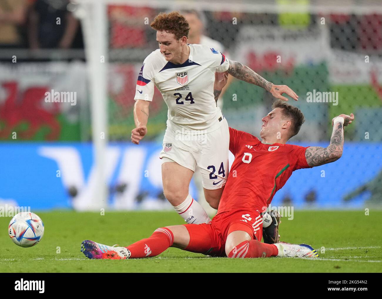 Joe Rodon of Wales and Josh Sargent of USA during the Qatar 2022 World ...