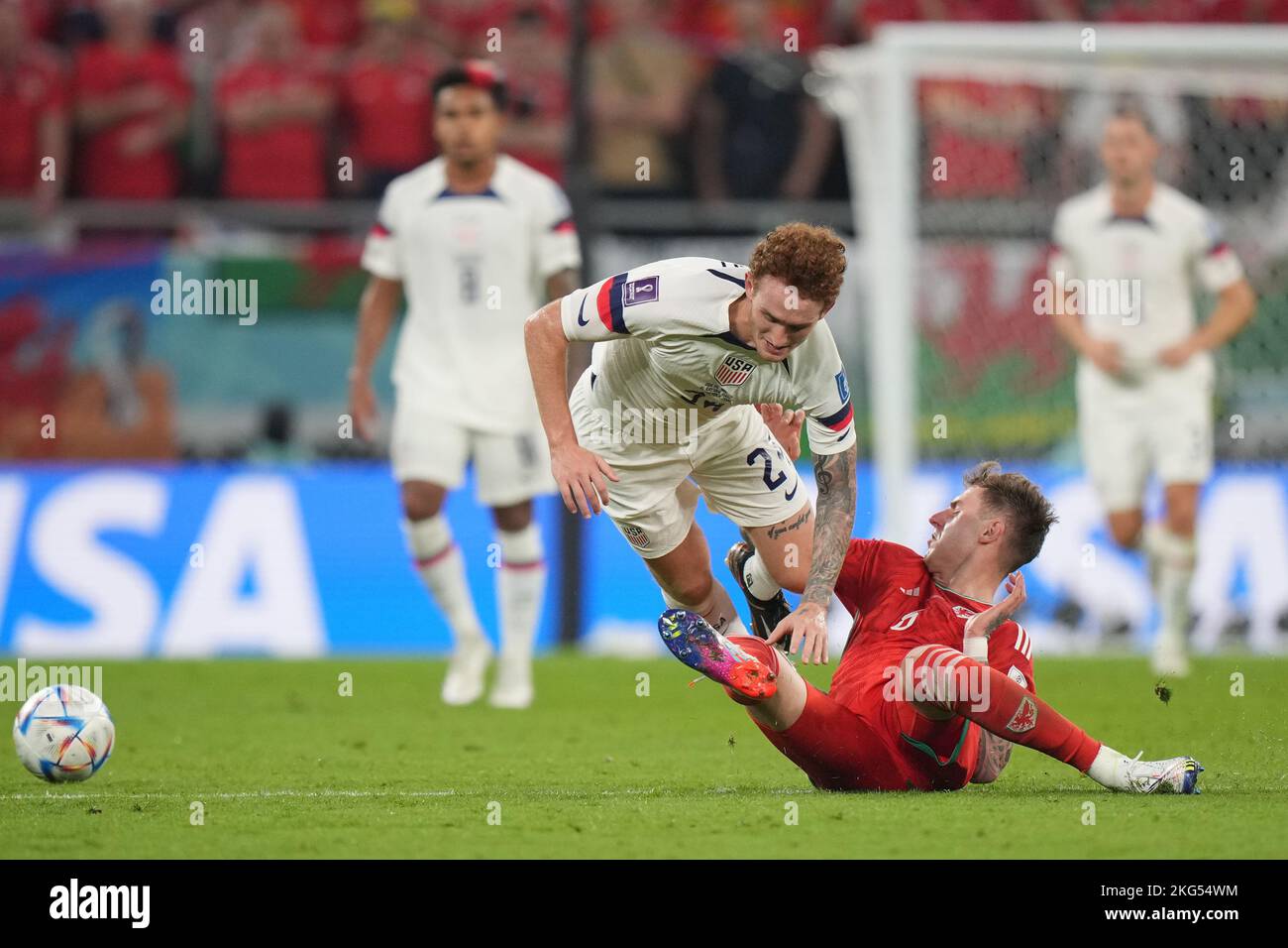 Joe Rodon of Wales and Josh Sargent of USA during the Qatar 2022 World ...