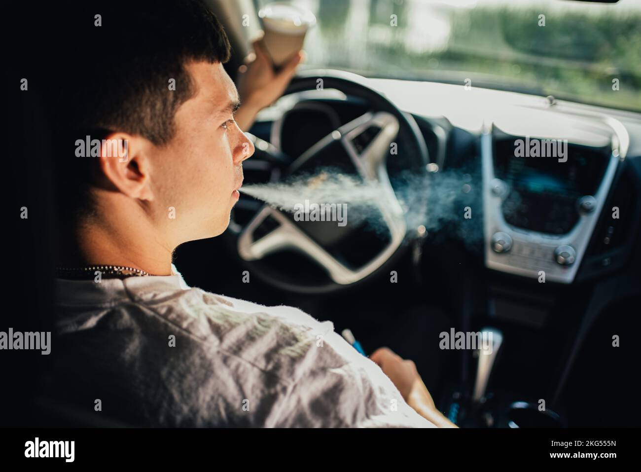 Guy smokes hi-res stock photography and images - Alamy