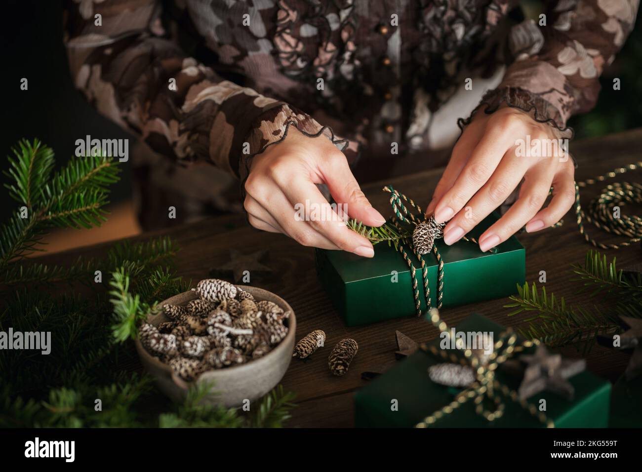 Woman packing christmas gift box hi-res stock photography and images ...
