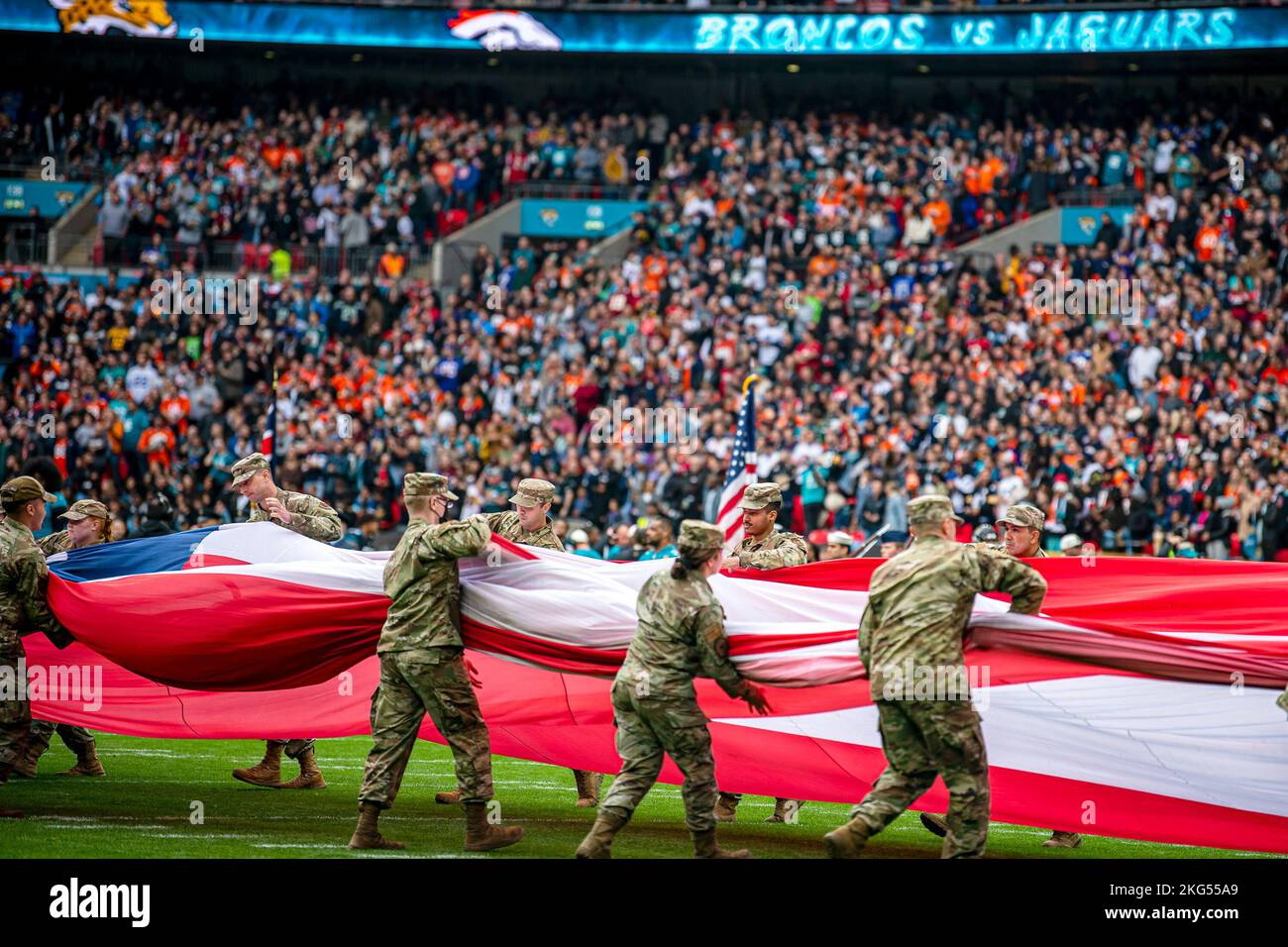 Airmen from the 501st Combat Support Wing pull together an American ...